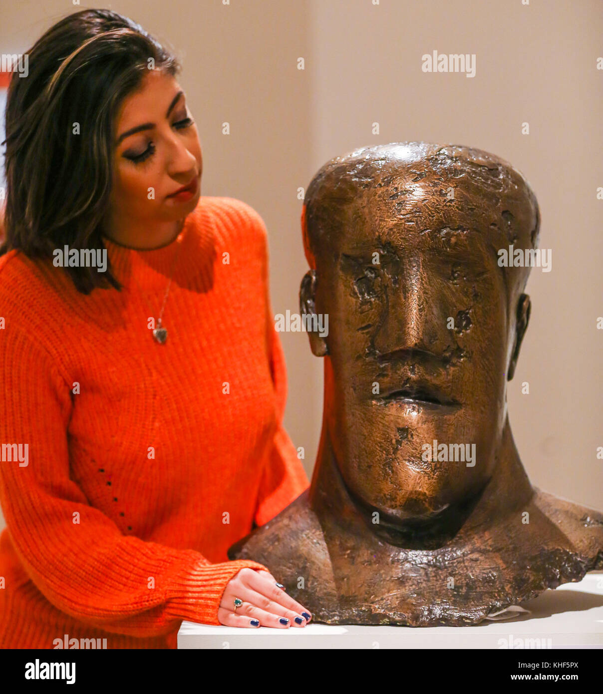 Sotheby’s London. UK 17 Nov 2017 - A woman looking Dame Elisabeth Frink ...