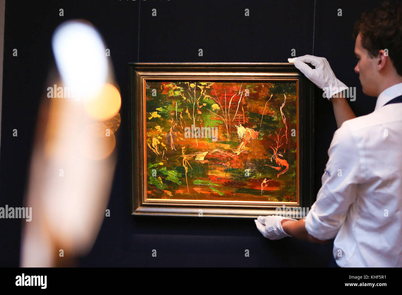 Sotheby’s London. UK 17 Nov 2017 - A Sotheby’s staff holds Sir Winston ...
