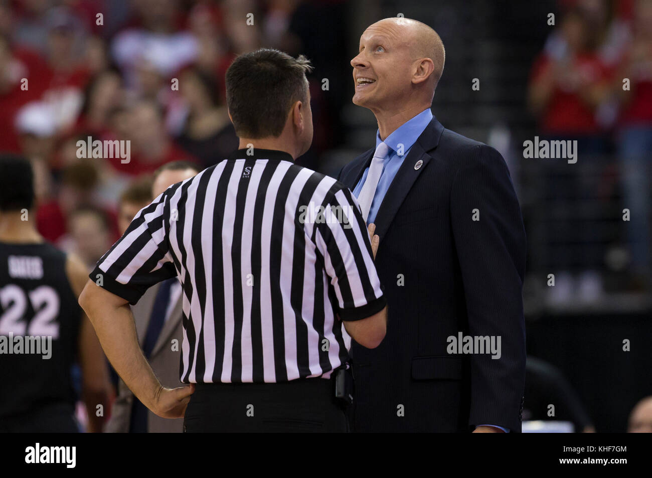 Madison, WI, USA. 16th Nov, 2017. Xavier coach Chris Mack talks with an ...