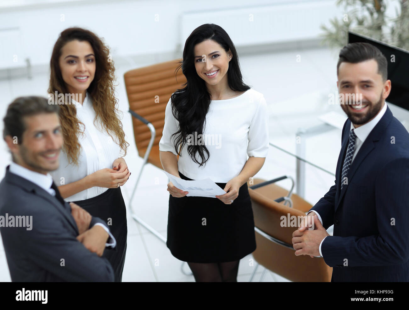 employees standing in a modern office Stock Photo - Alamy