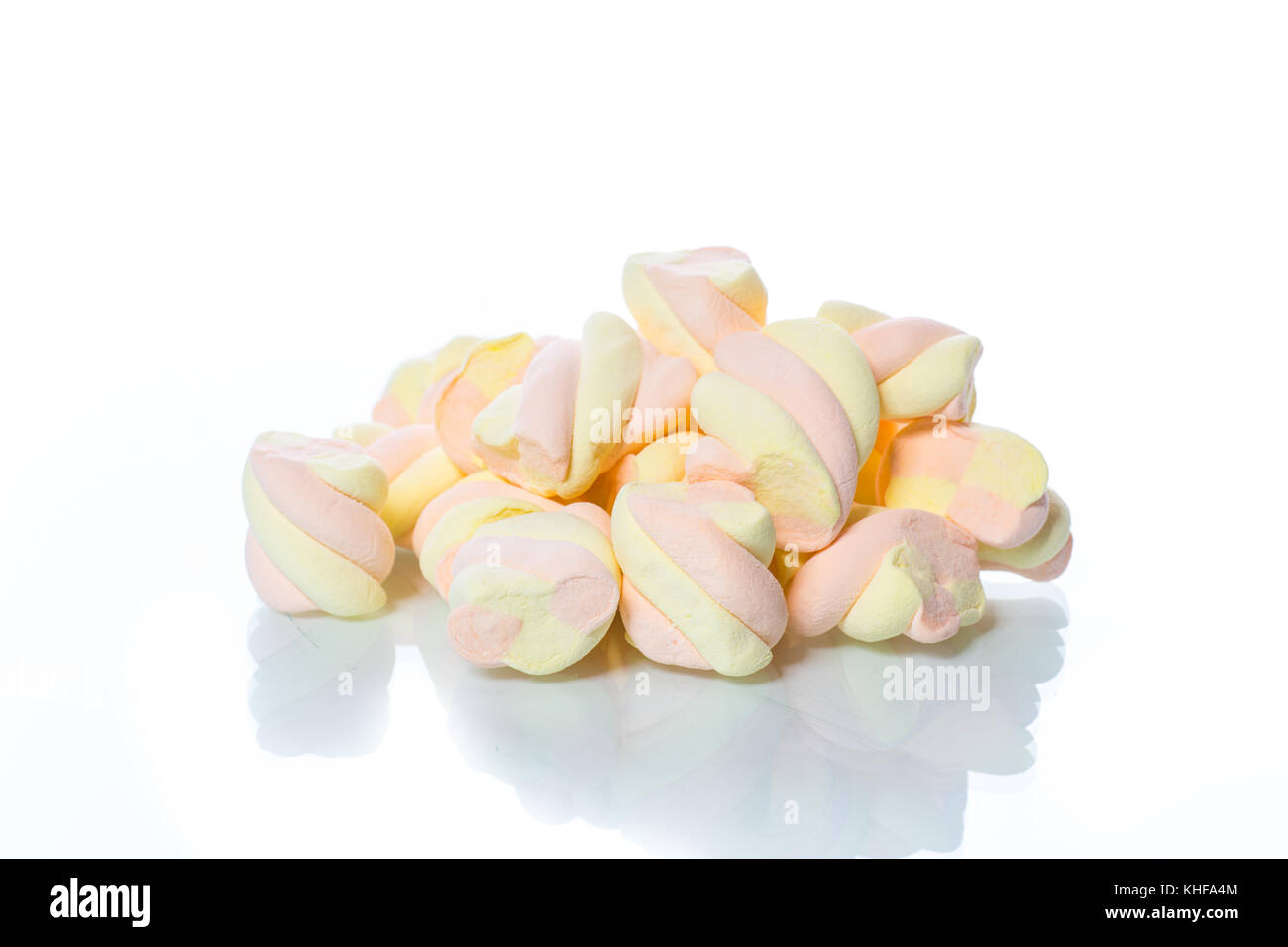 sweet multi-colored candy marshmallow on white background Stock Photo ...