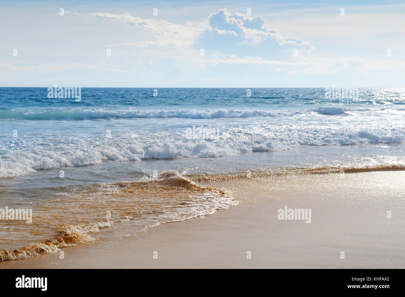 seascape, sand beach and blue sky Stock Photo - Alamy