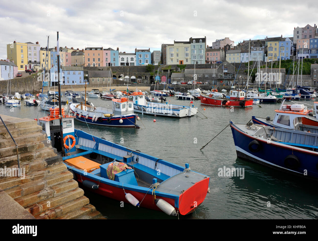 Tenby Harbour yachts and fishing boats at the holday resort town of ...