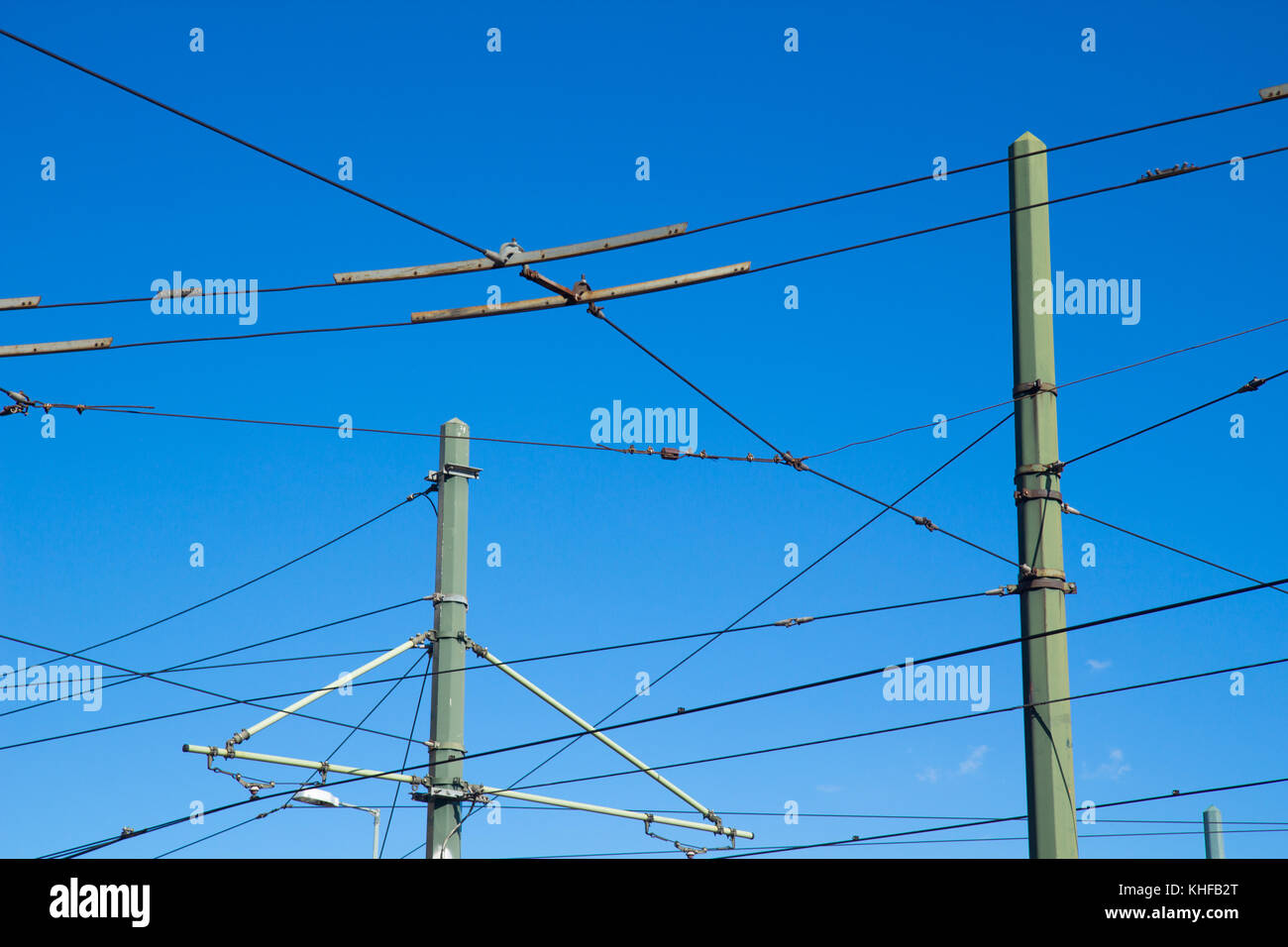 Electricity cables on pylons forming patterns and shapes in the sky ...