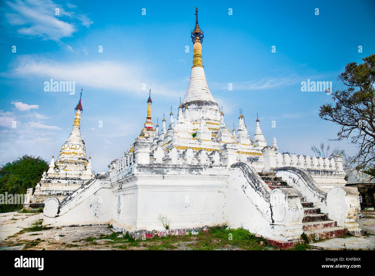 The brick yellow Maha Aung Mye Bon Zan monastery on the Inwa royal site ...
