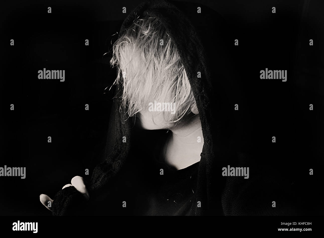 Woman in black hooded hi-res stock photography and images - Alamy