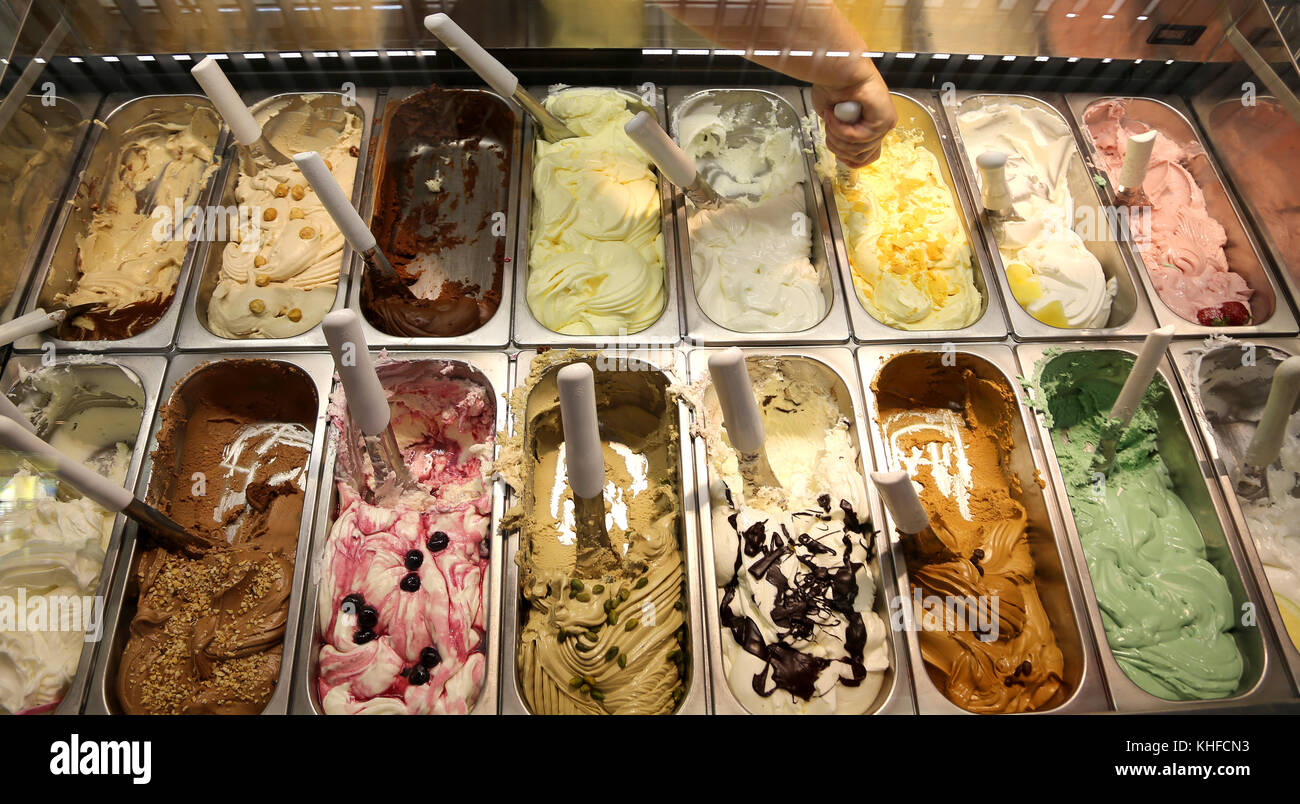 many trays of icecream in the italian ice cream shop Stock Photo - Alamy