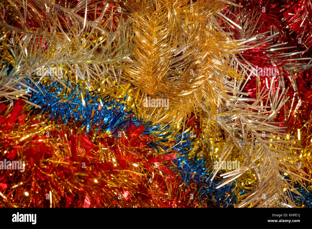 Large bright colorful christmas tinsel heap. Selective focus Stock ...