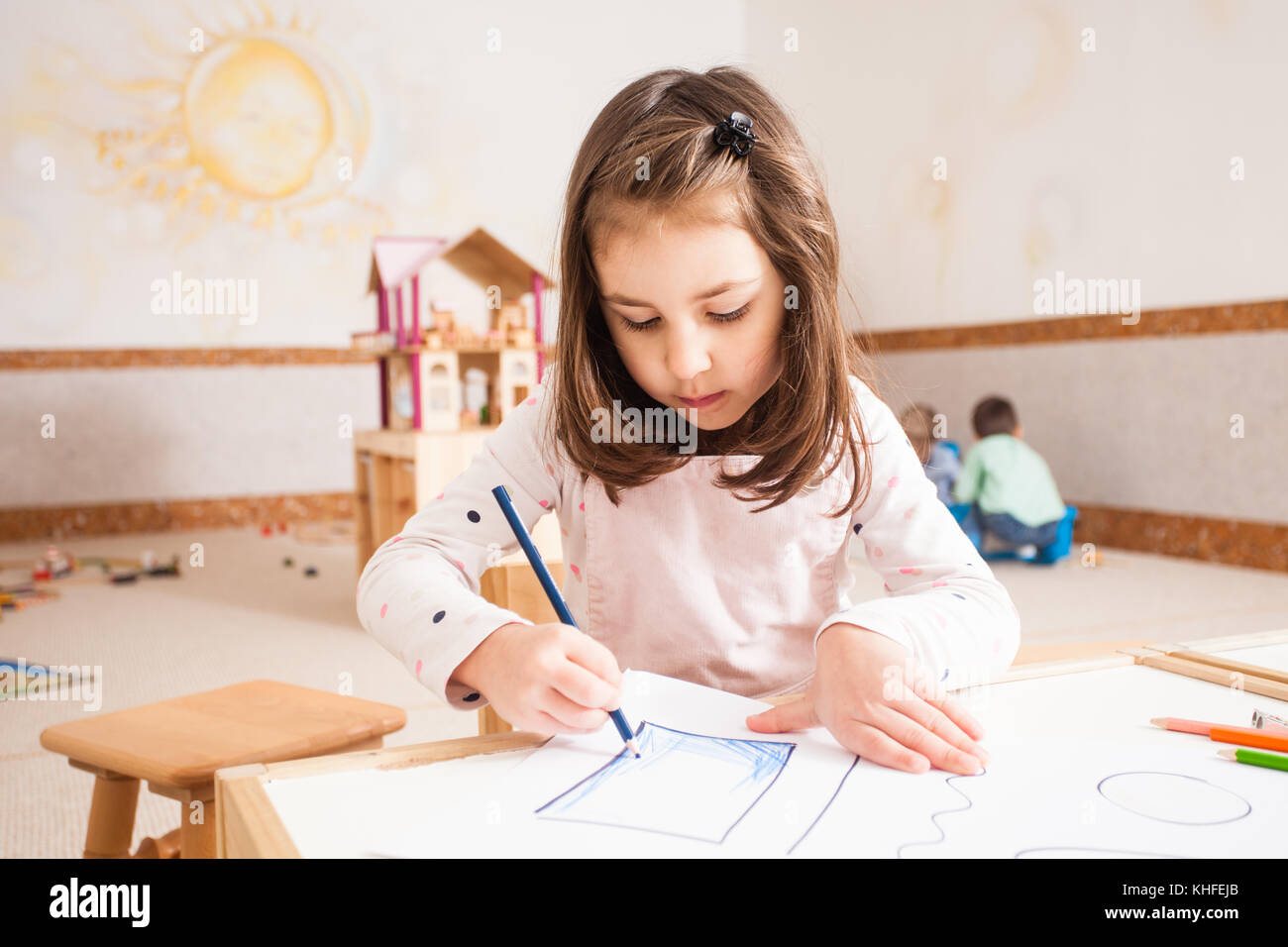 Drawing lesson in kindergarten Stock Photo - Alamy