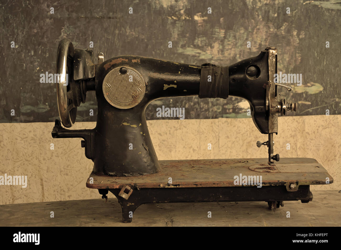 Abandoned stitching machine Stock Photo - Alamy