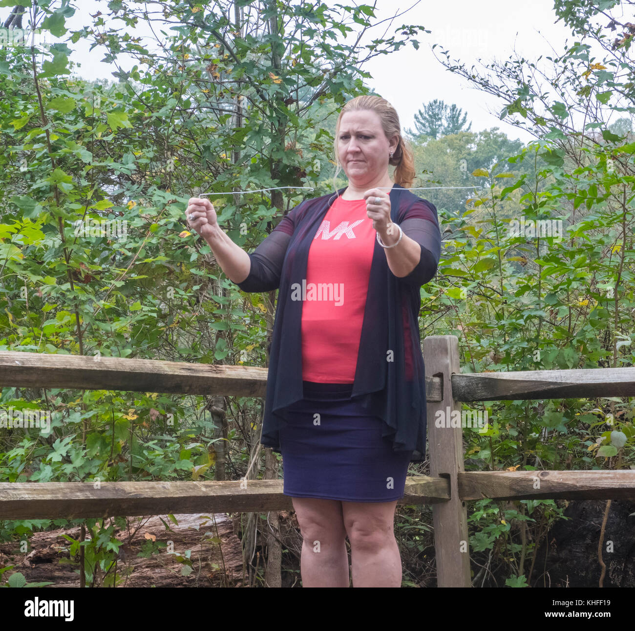 Woman dowsing rods hi-res stock photography and images - Alamy