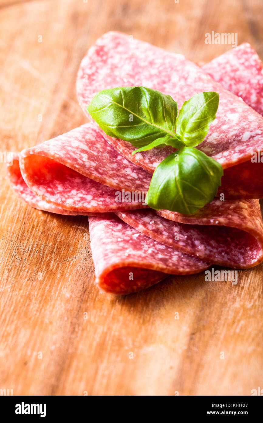 Salami slices macro Stock Photo - Alamy