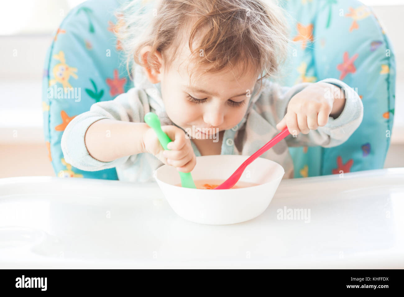The girl is eating very fast Stock Photo - Alamy