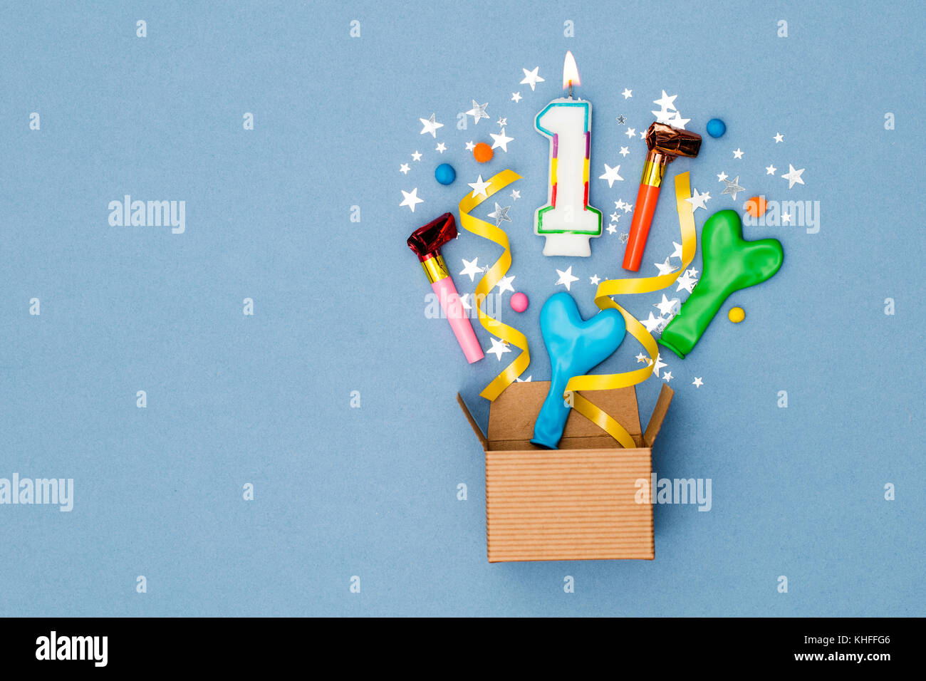 Number 1 celebration present background. Gift box exploding with party ...