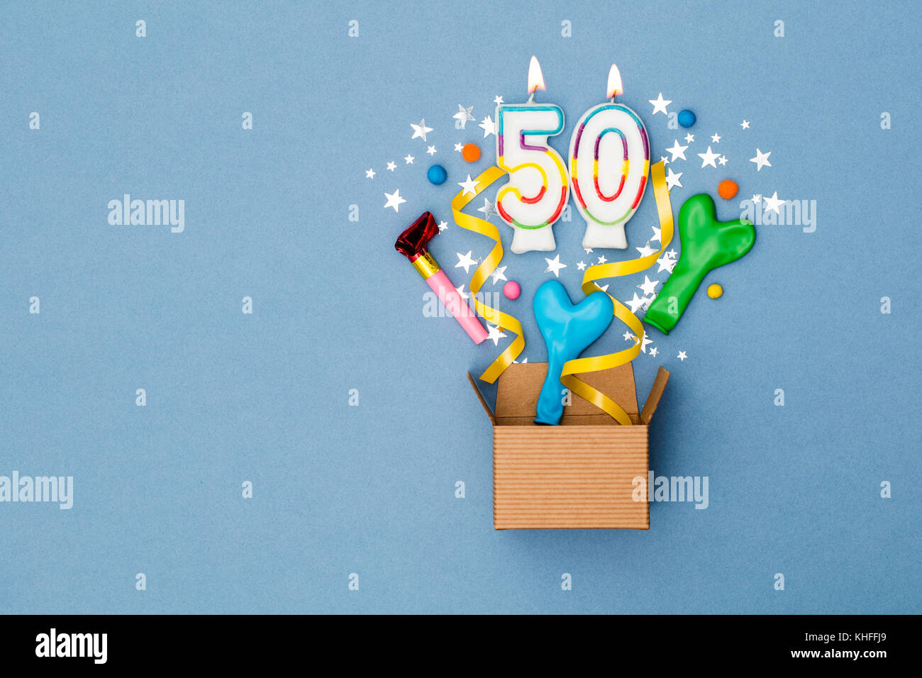 Number 50 celebration present background. Gift box exploding with party ...