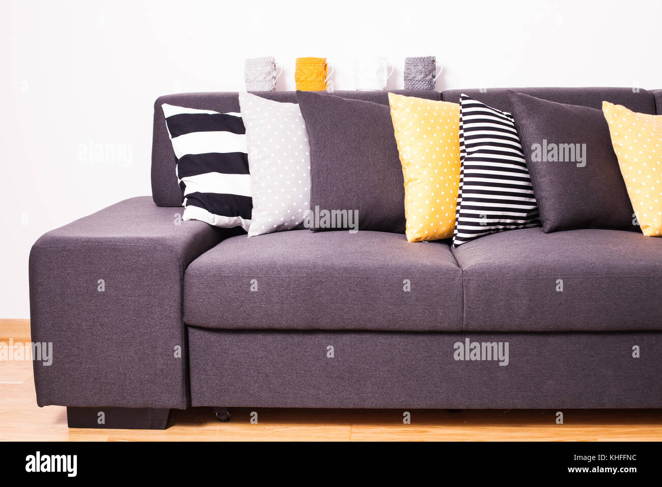 Sofa with pillows Stock Photo - Alamy
