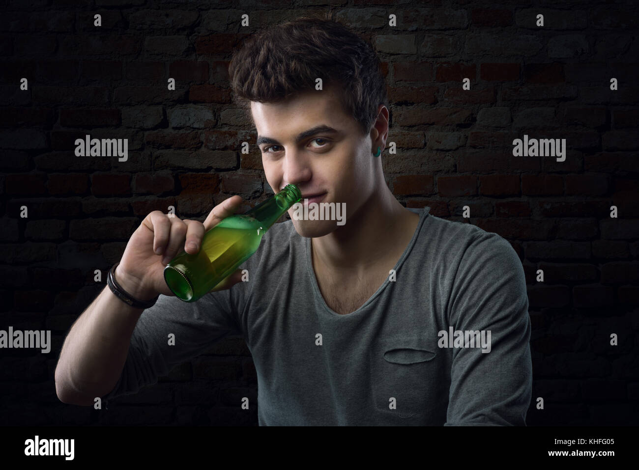 Cool handsome guy having beer hi-res stock photography and images - Alamy