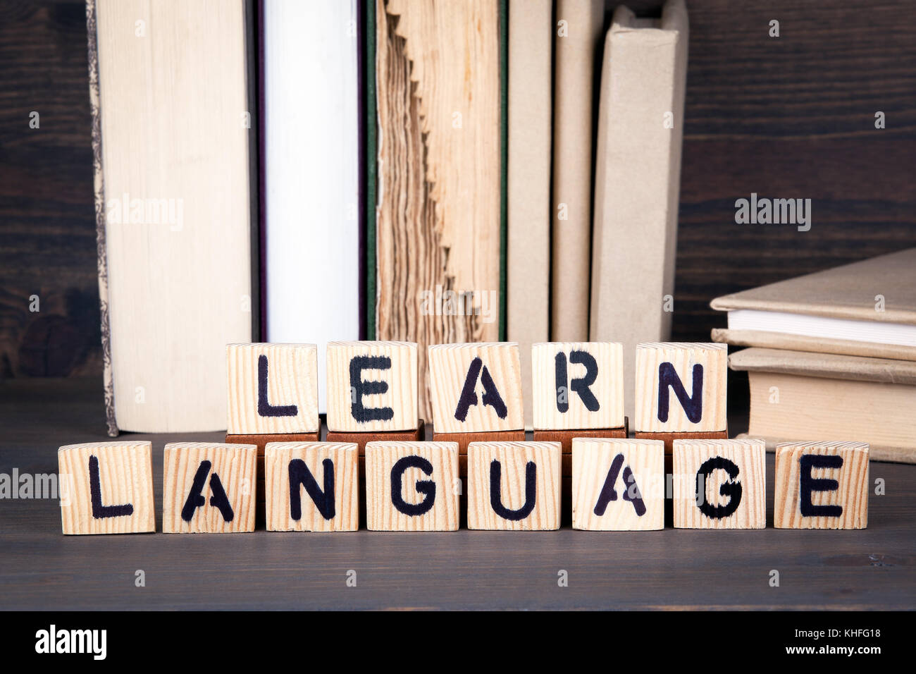 learn language, wooden letters on wooden table. Education, success and ...
