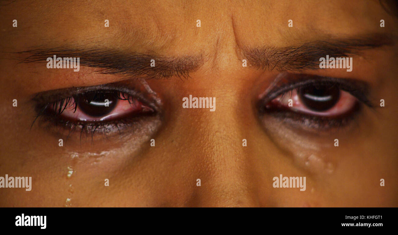 Tear rolling hi-res stock photography and images - Alamy