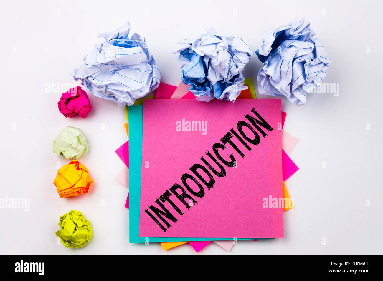 Writing text showing Introduction written on sticky note in office with ...
