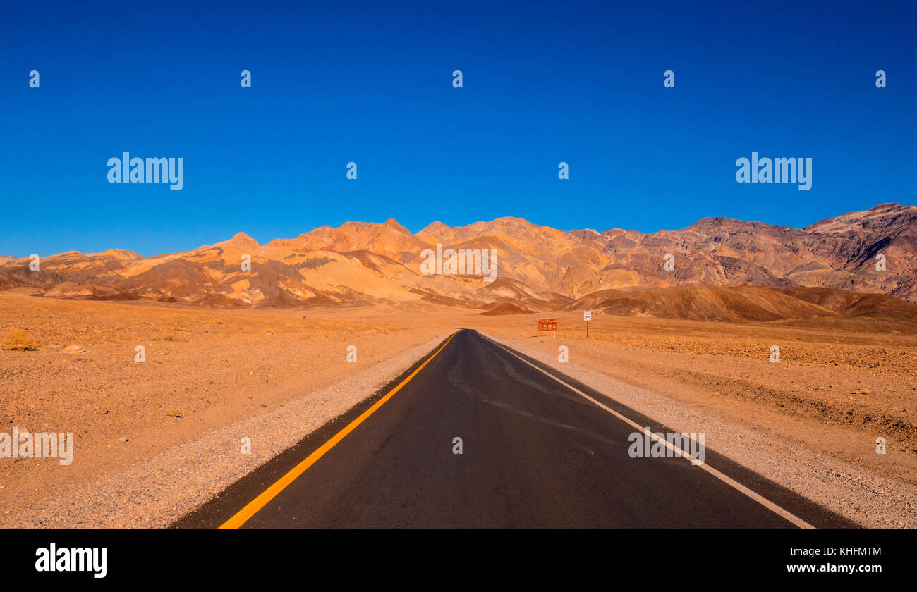 Road through the desert of Death Valley in California Stock Photo - Alamy
