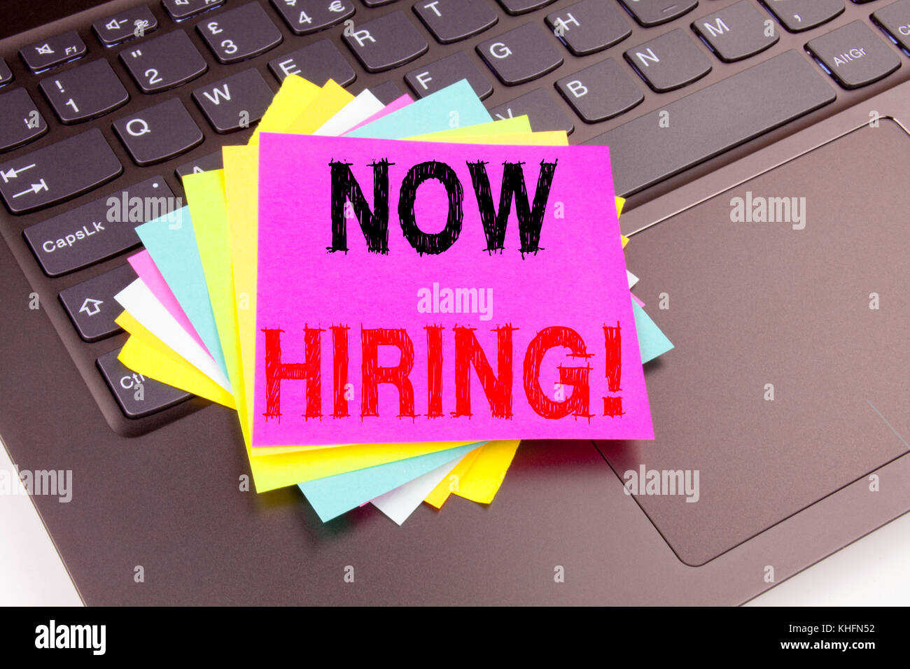 Now Hiring writing text made in the office close-up on laptop computer ...