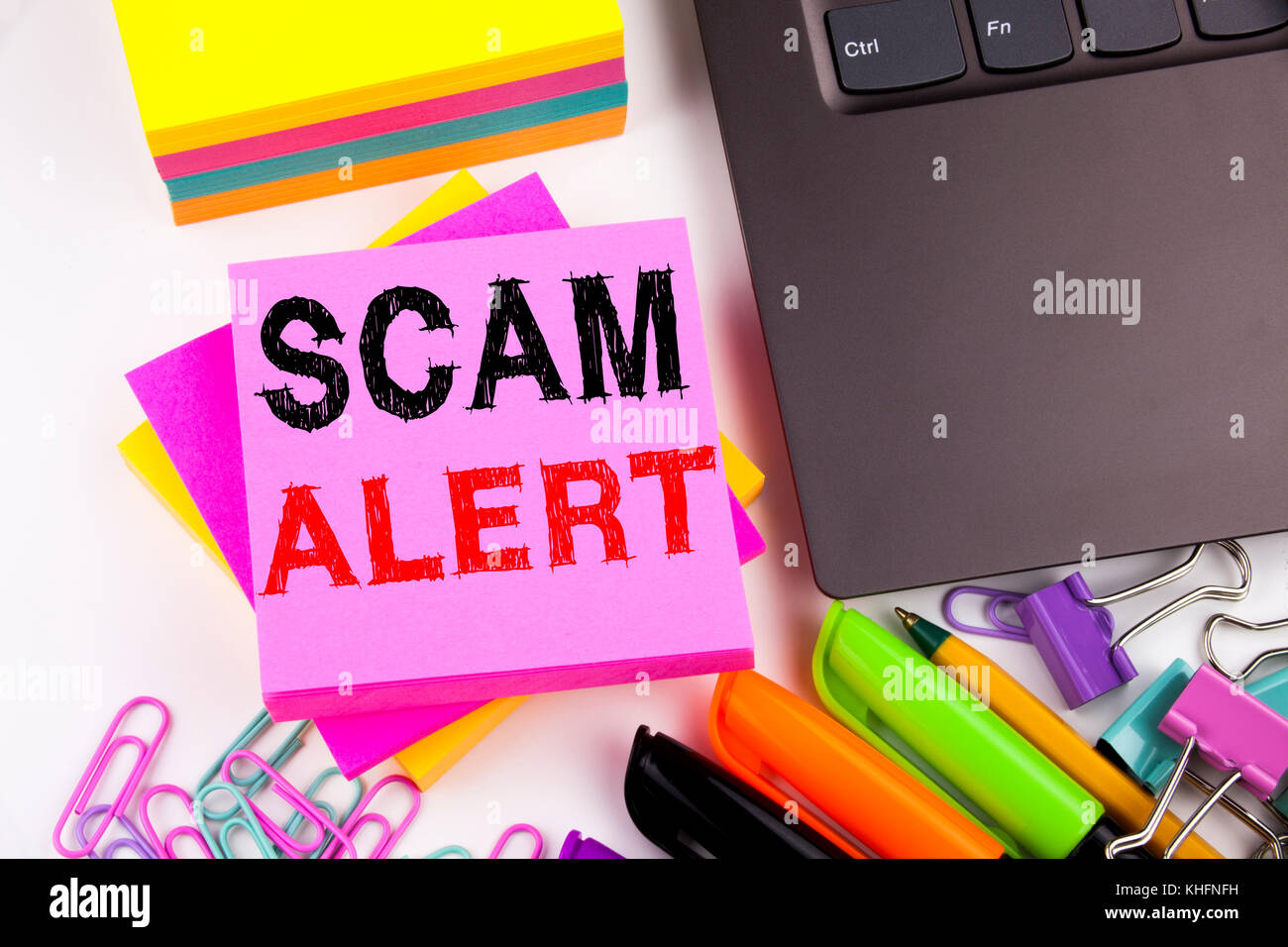 Scam Alert writing text made in the office close-up on laptop computer ...