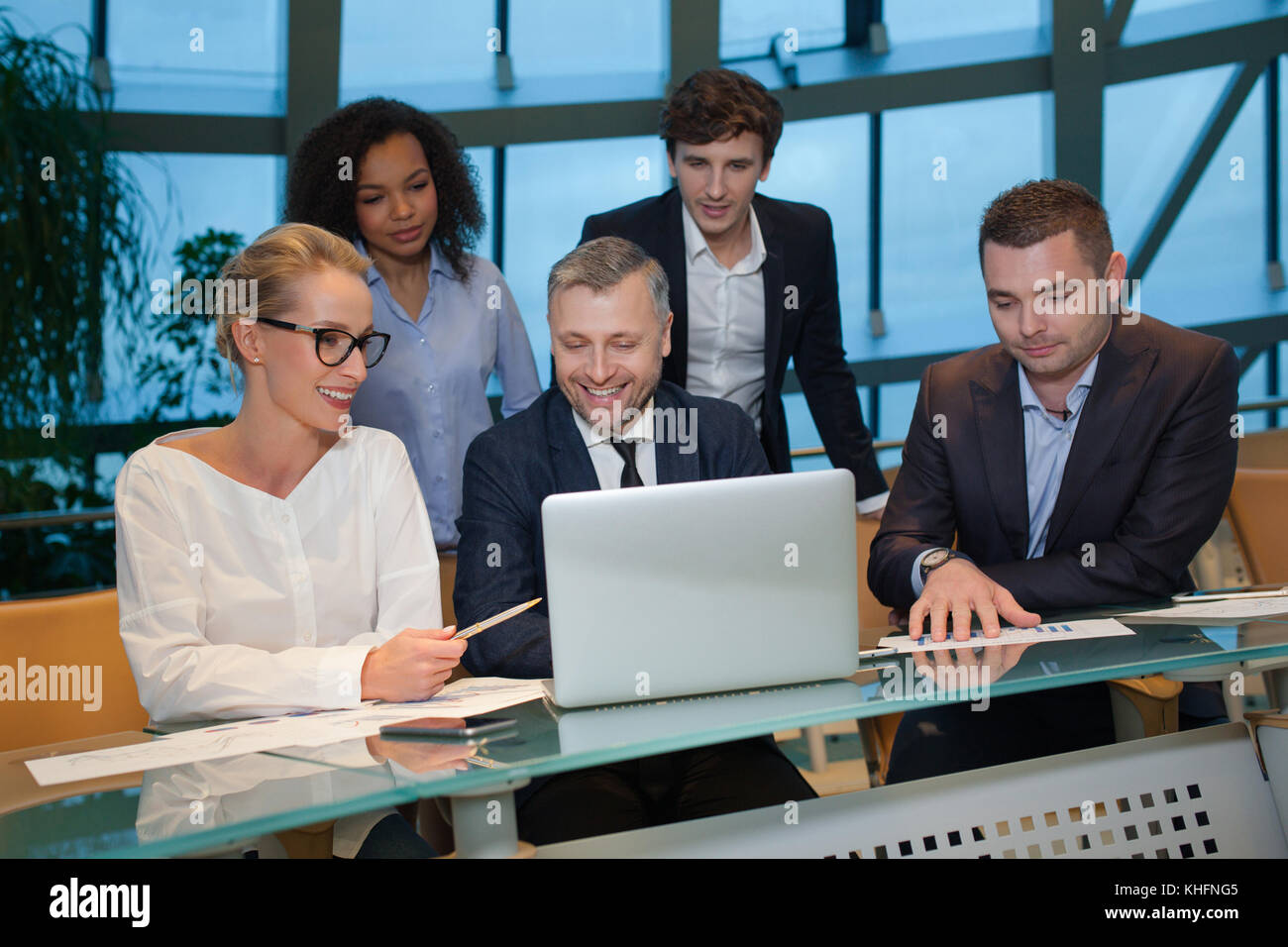 Business people working as a team at the office Stock Photo - Alamy