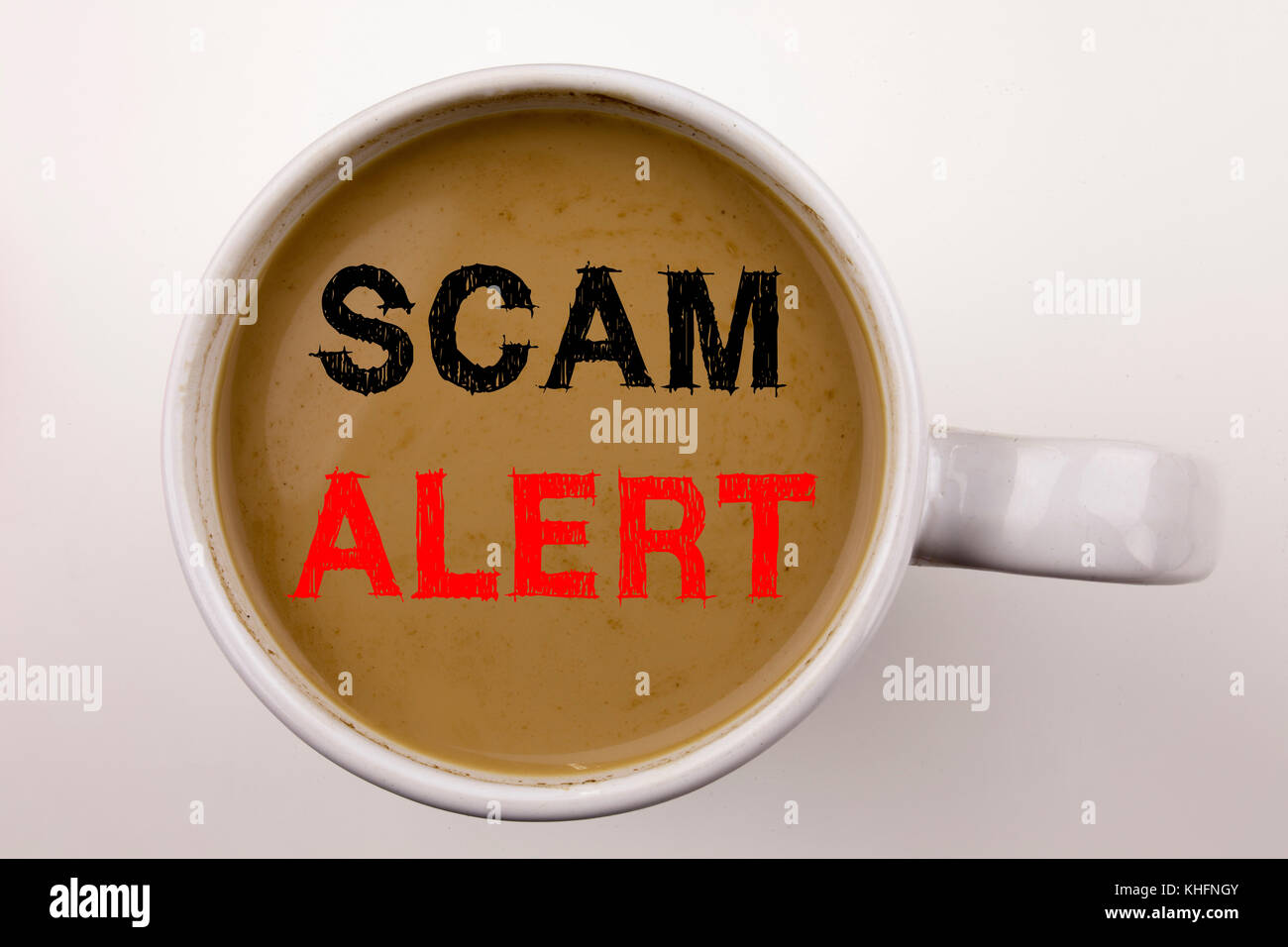 Scam Alert Writing text in coffee in cup. Business concept for Scam ...