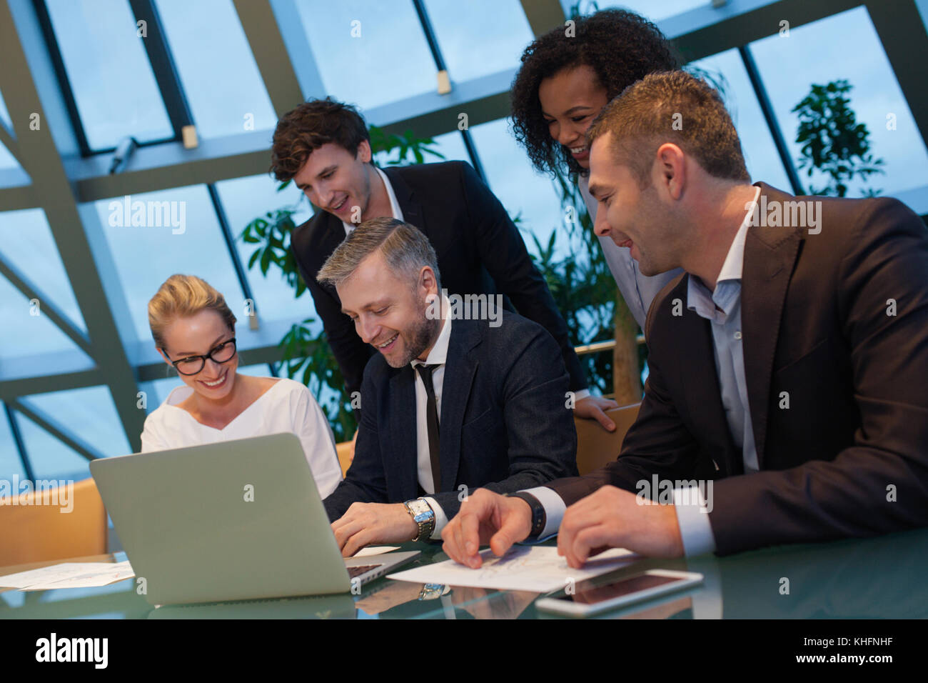 Business people working as a team at the office Stock Photo - Alamy