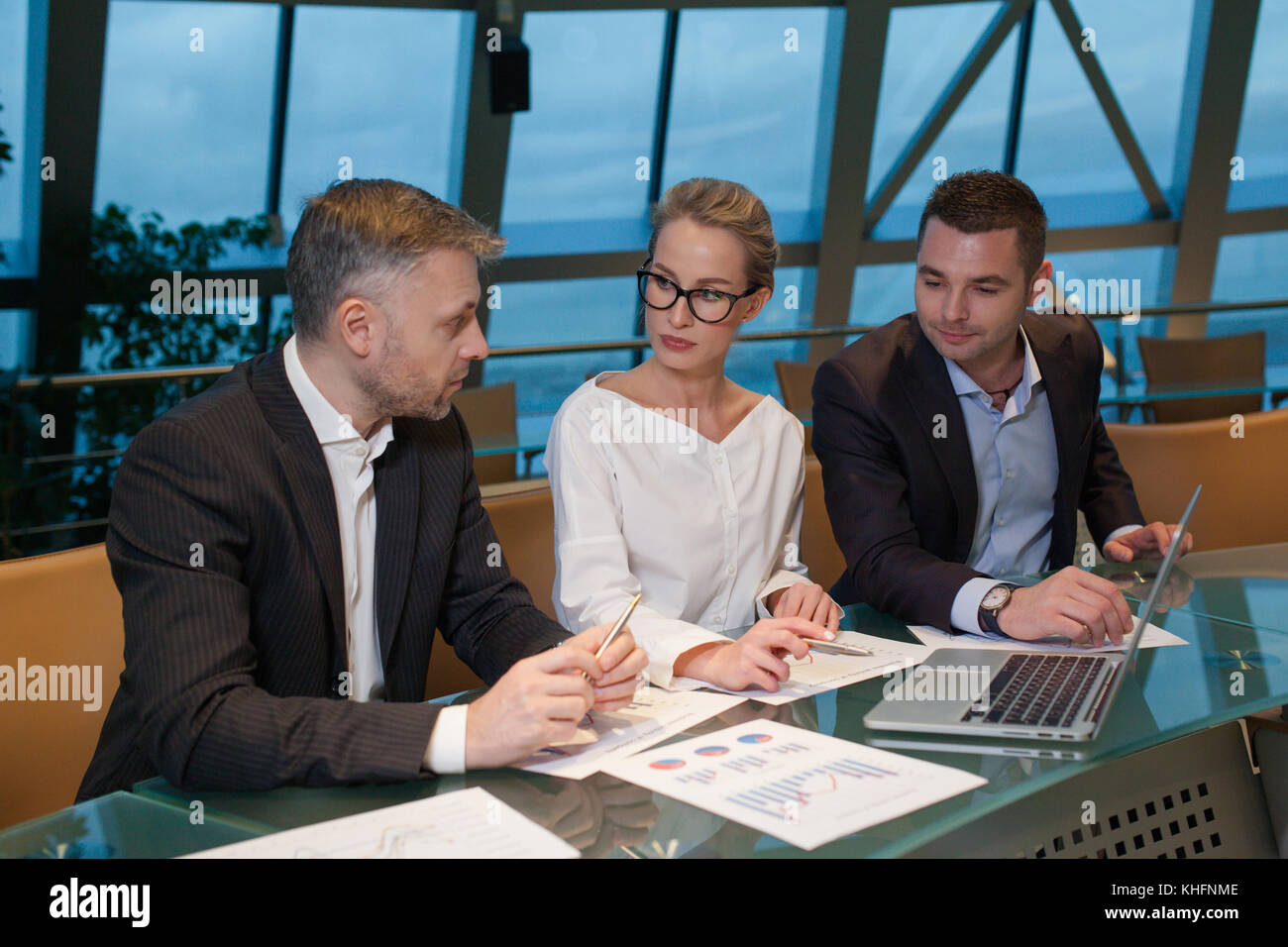 Business people working as a team at the office Stock Photo - Alamy