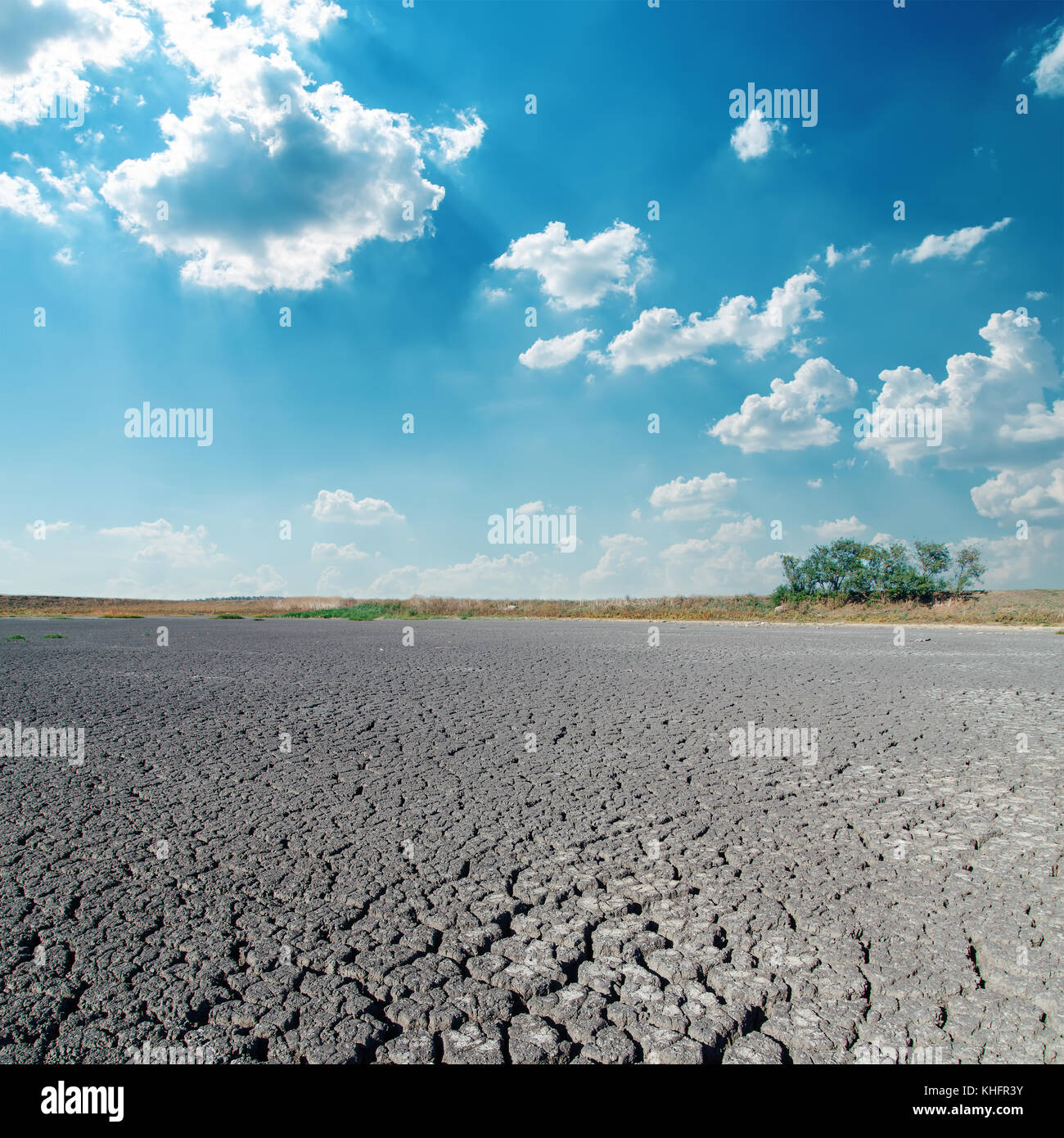desert and clouds in blue sky Stock Photo - Alamy