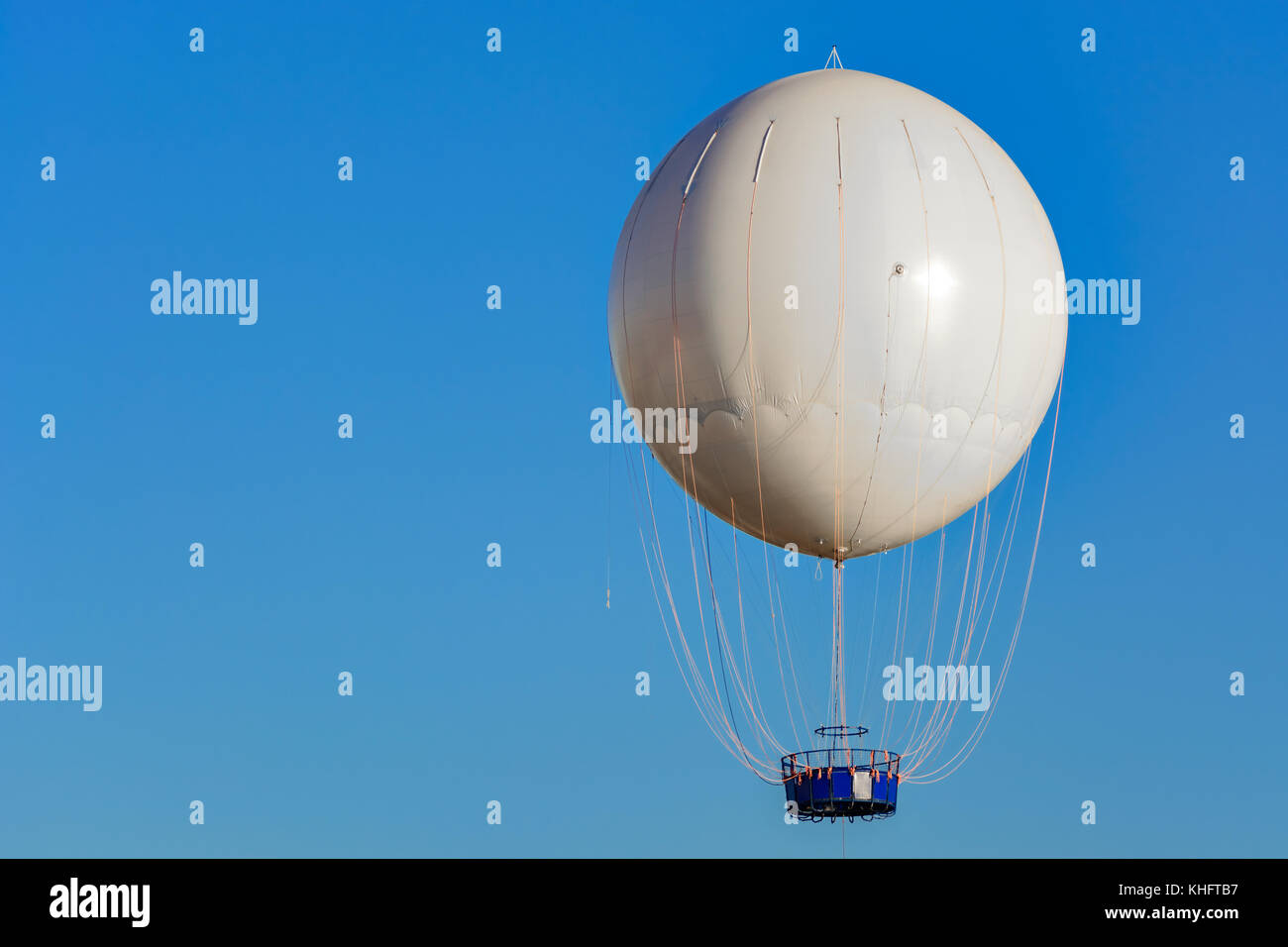 White balloon, used as an aerial lift, with an overview of the panorama ...