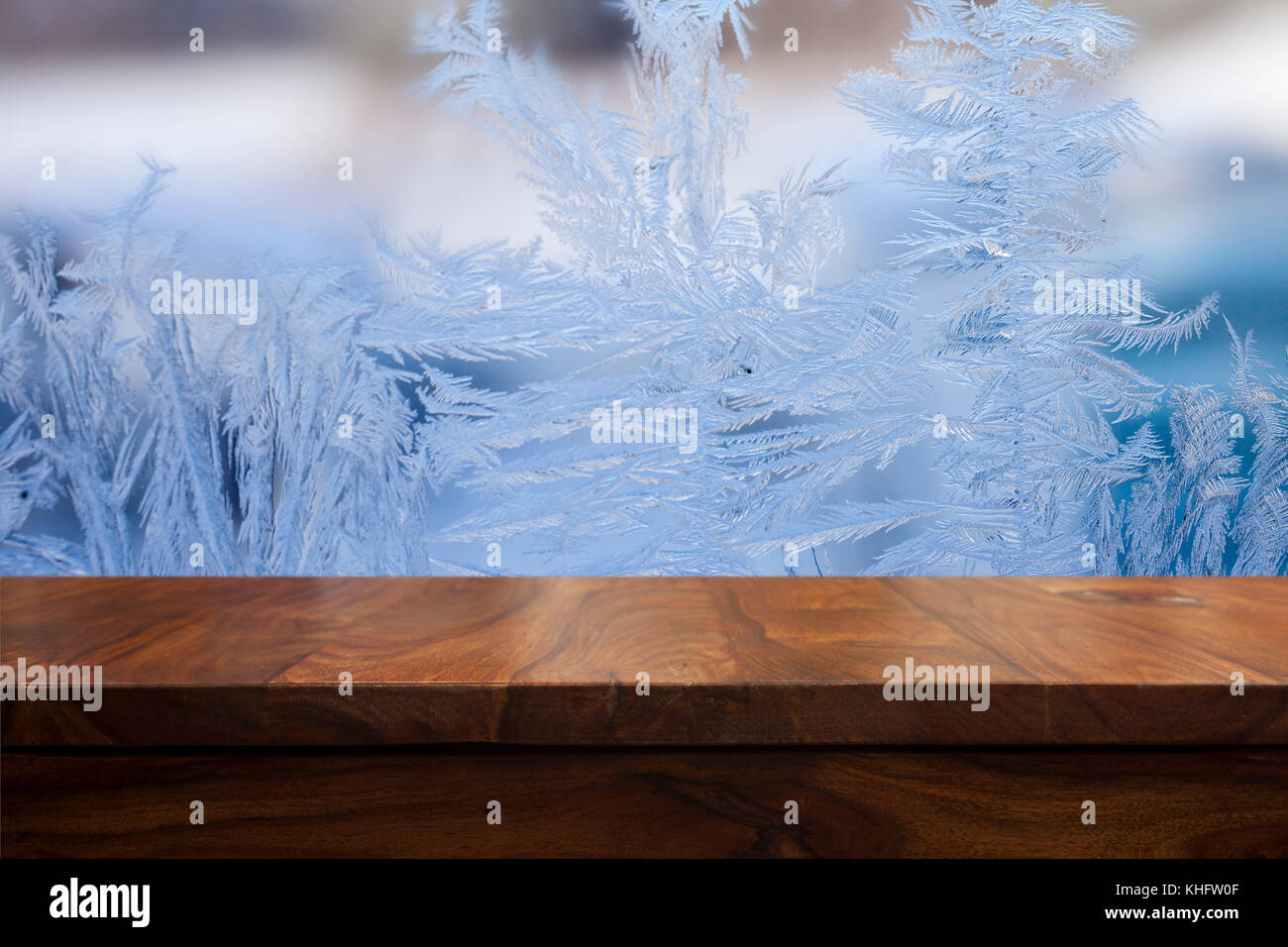 Empty top wooden table and frozen blurred background Stock Photo - Alamy