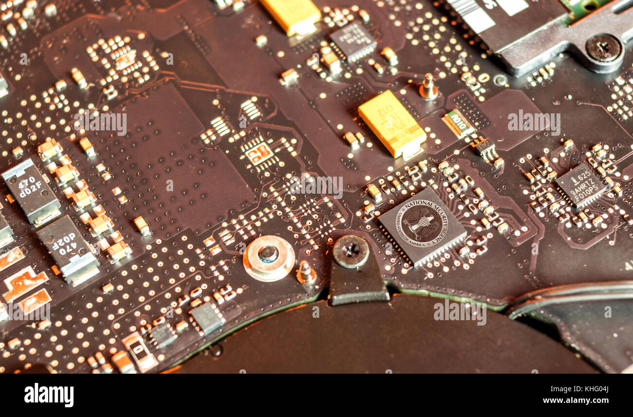 Illustration of a spying Chip inside a computer with the NSA logo ...