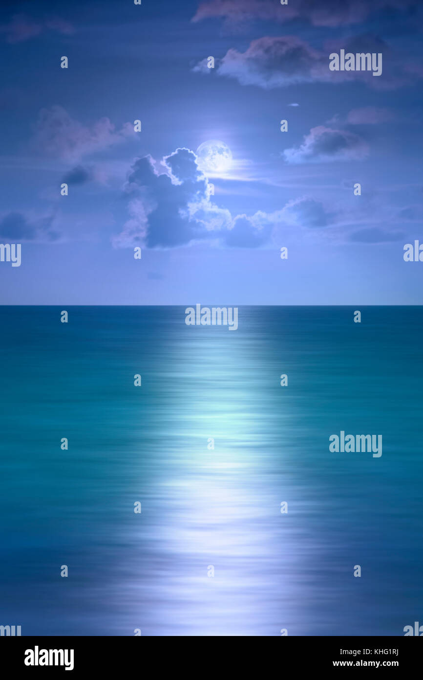 A beautiful and bright moon rises over the ocean at Fort Lauderdale ...