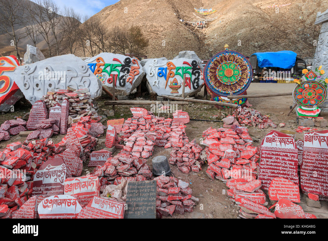 Yushu, China - November 3, 2017: Mani stones with buddhist mantra Om ...