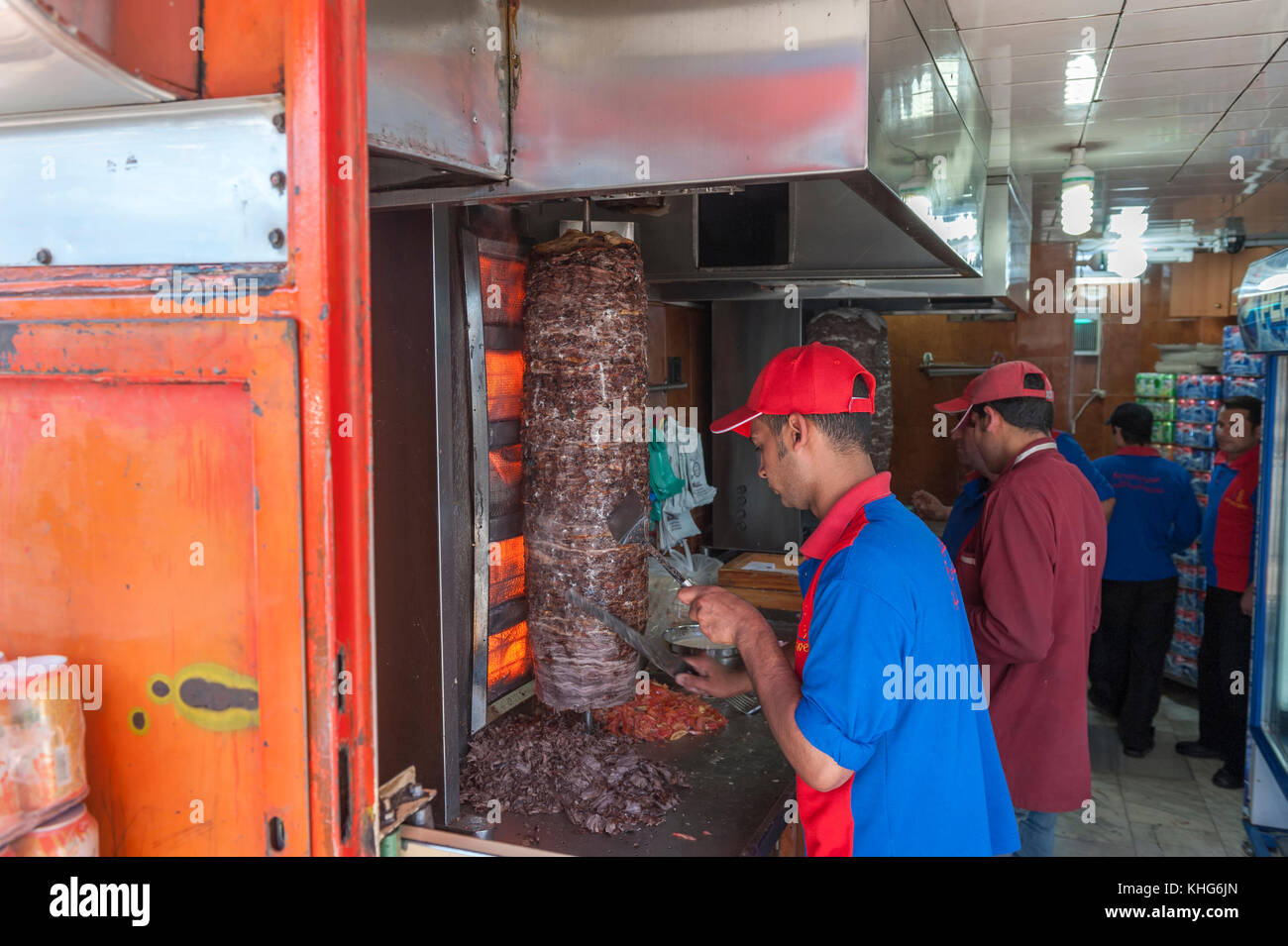 Man Slicing Meat at Shawarma Reem take-away restaurant, Amman, Jordan ...