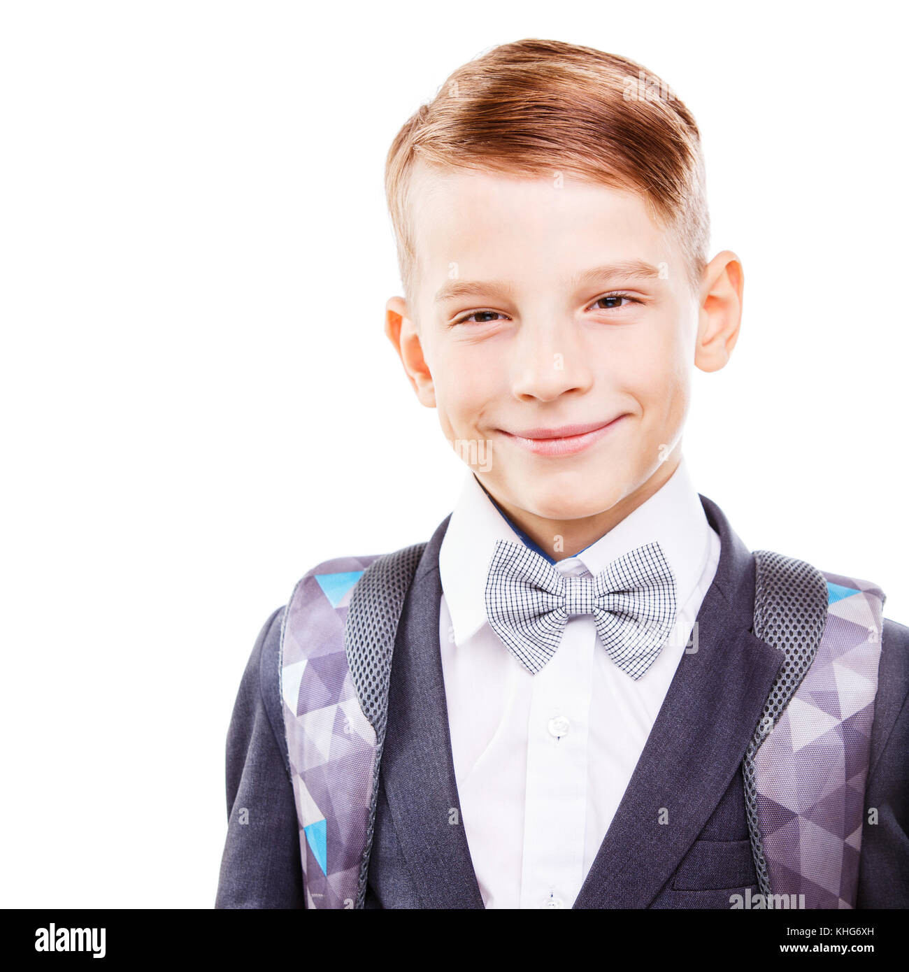 Portrait of happy schoolboy with backpack isolated on white background ...