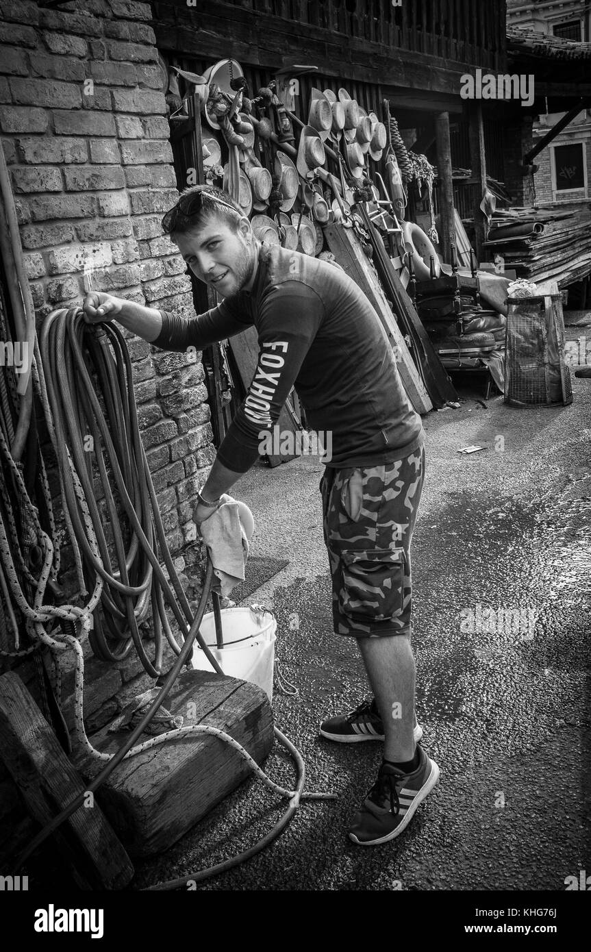 A scene from a Gondola repair workshop in Venice where a gondolier is ...