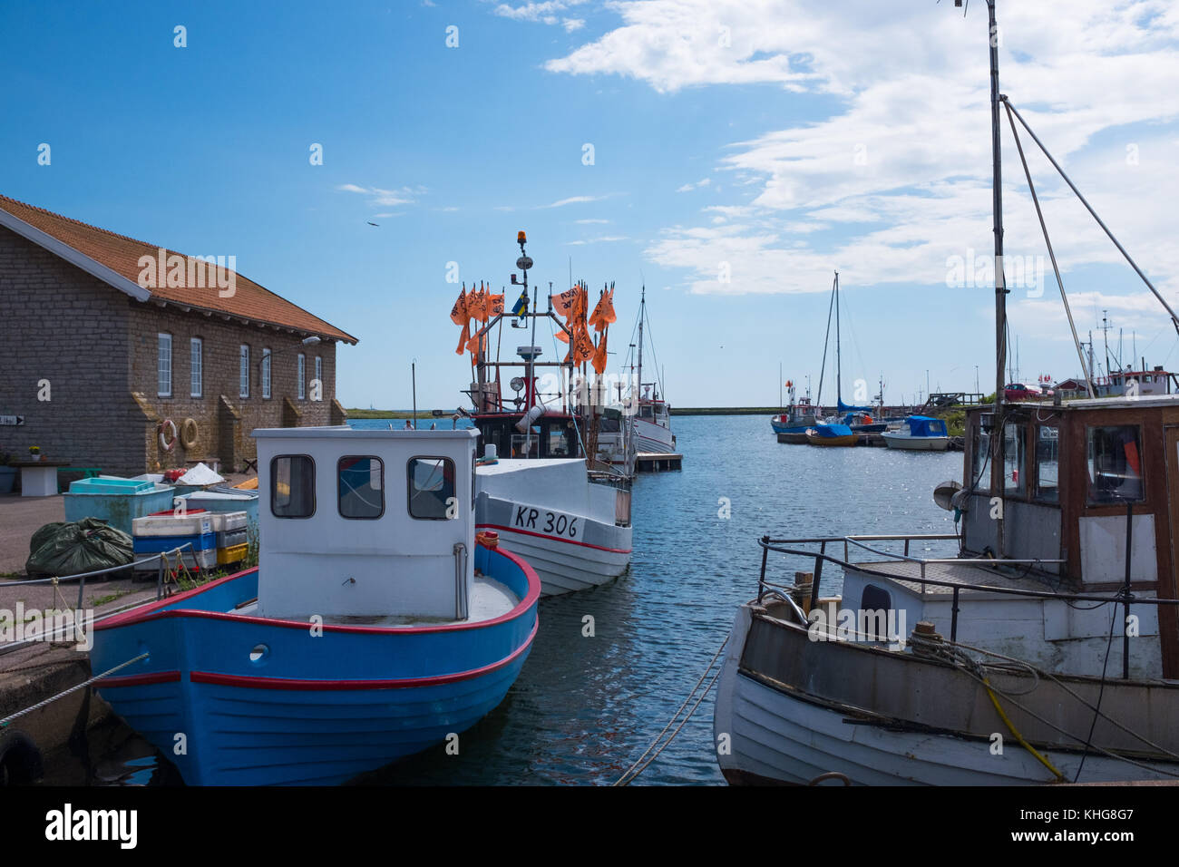 A bright sunlit fishing-harbor in southern sweden Stock Photo - Alamy