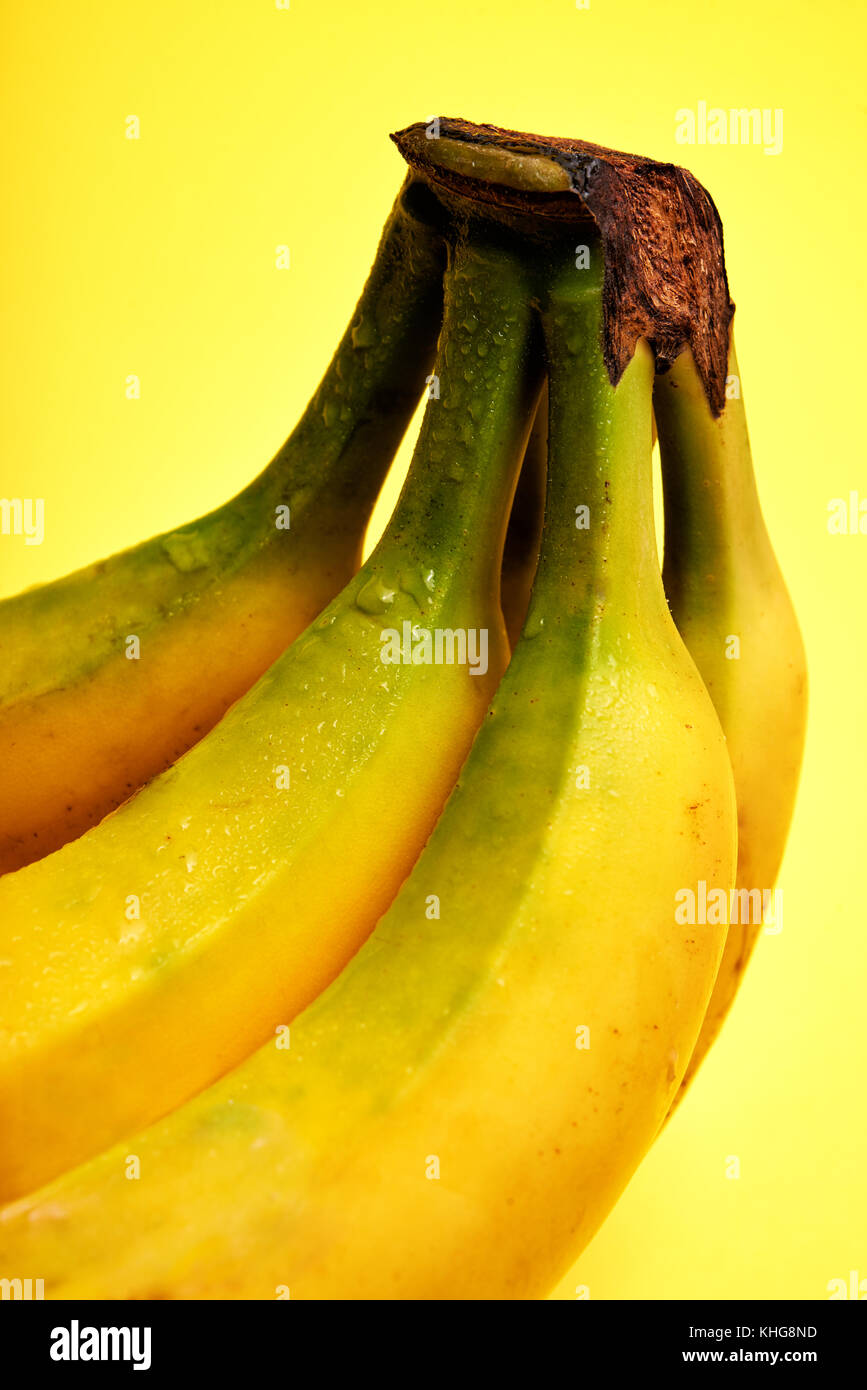 ripe bananas with water drops close up Stock Photo - Alamy