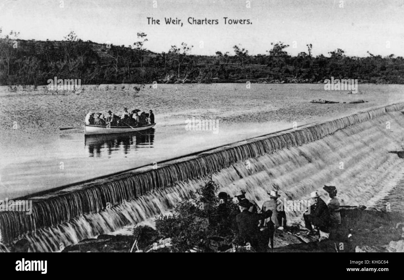 This photograph depicts a rowing activity on the Charters Towers Weir ...