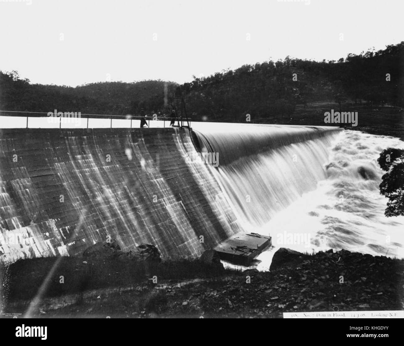 2 196679 Water flowing over the spillway of a dam at Mount Morgan, 1908 ...