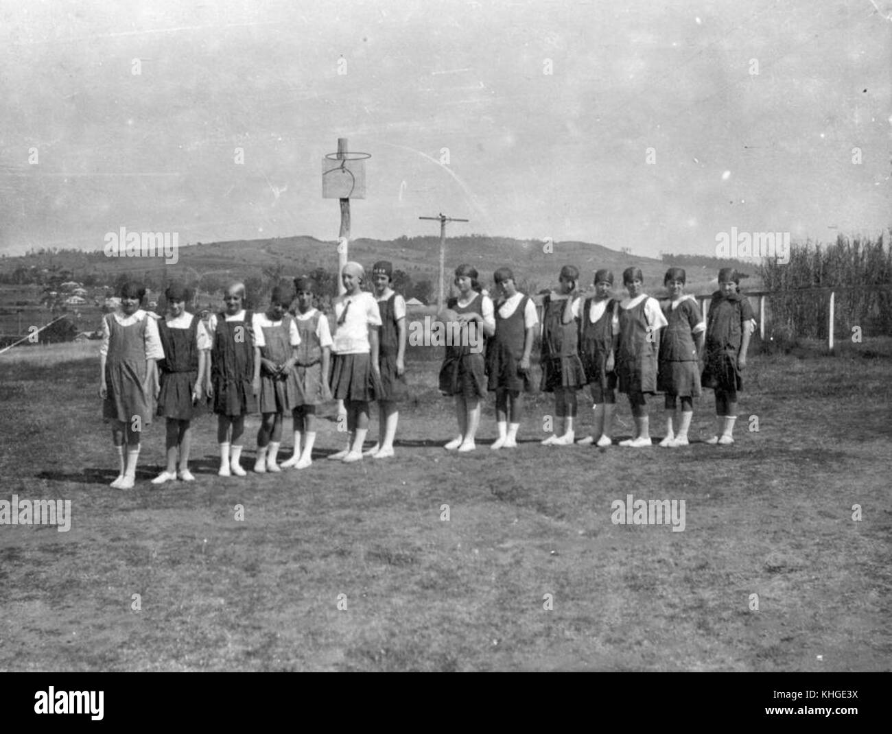 1 161583 Netball team posing on a grass court, ca. 1925 Stock Photo - Alamy