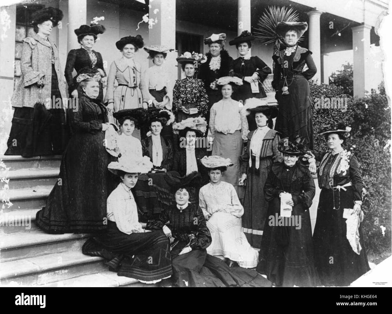 1 71843 Group of women photographed on the front steps of a building ...