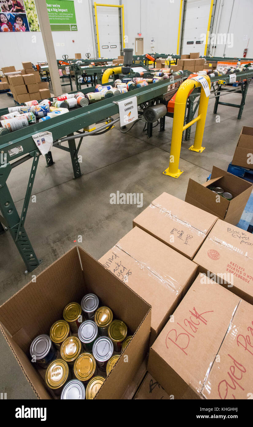 Sorting equipment and sorted canned goods at Capitol Area Food Bank in ...