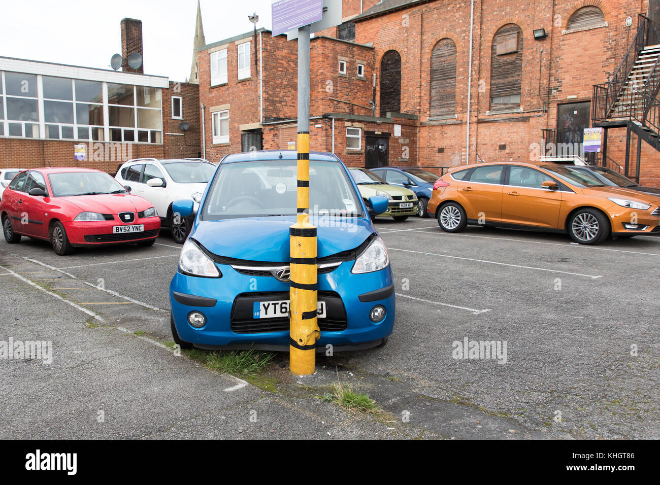 A car crashed into a lamp post Stock Photo - Alamy