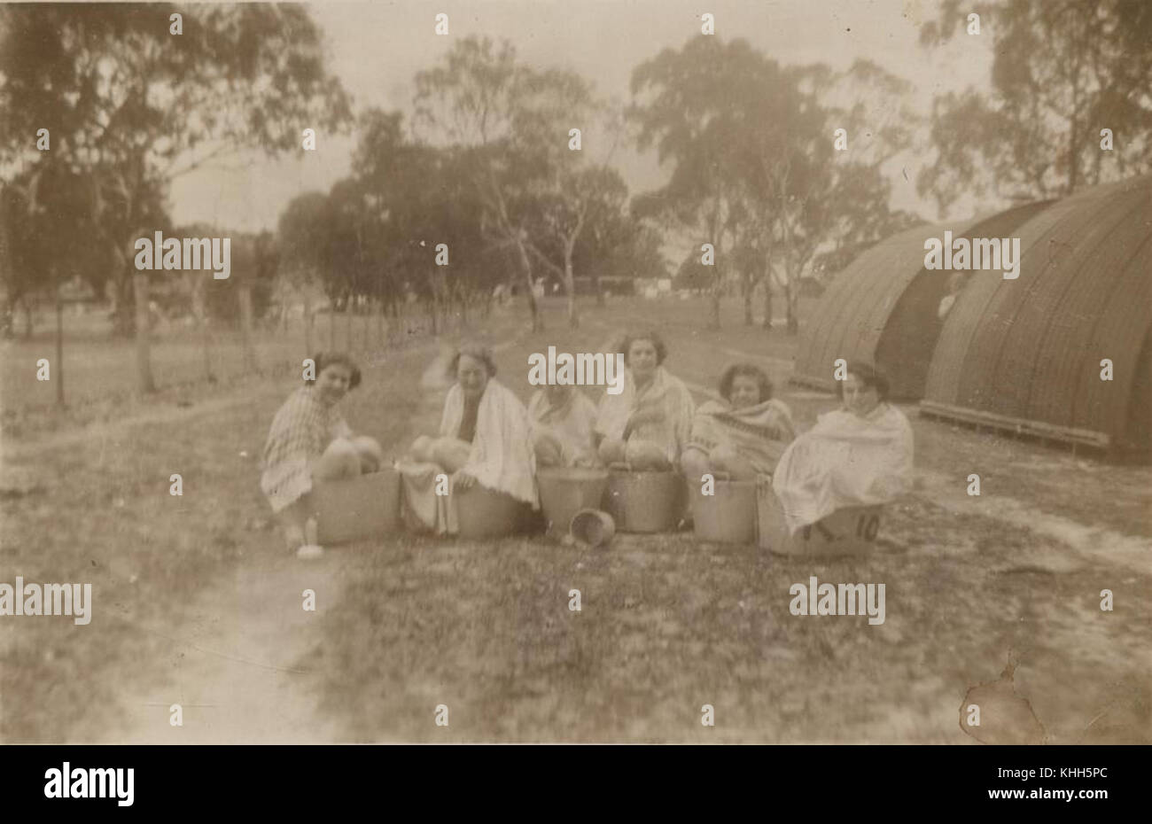 2 254134 Women from the Australian Women's Army Service bathing in tubs ...