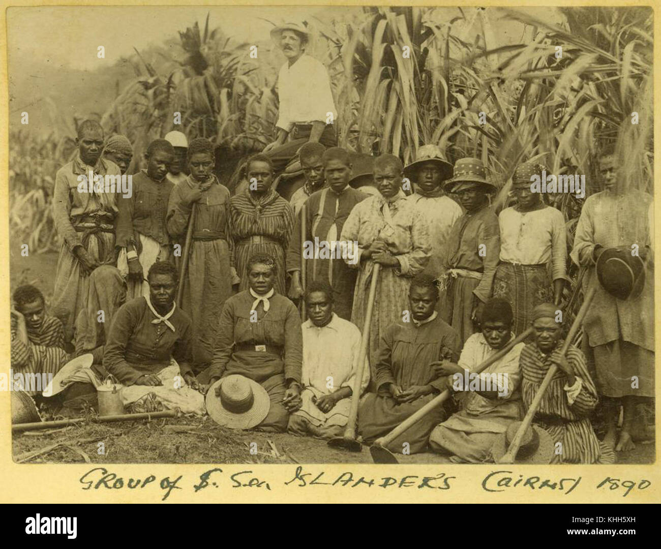A historical photo showing a group of South Sea Islander workers ...